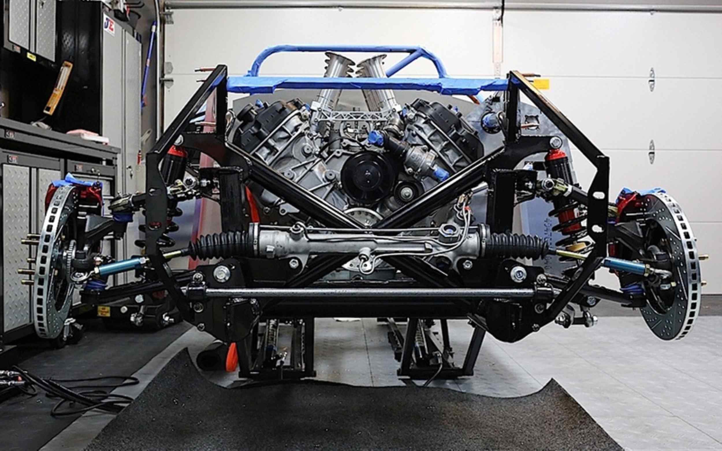 Portable Car Lift at the Race Track - Race Track Lift | QuickJack